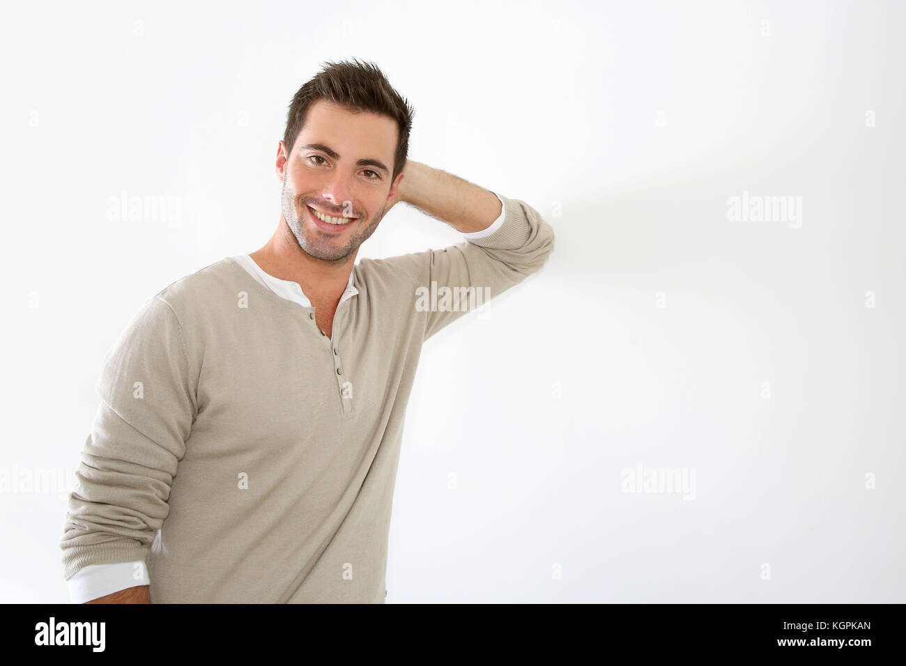 Handsome guy standing on white background Stock Photo - Alamy