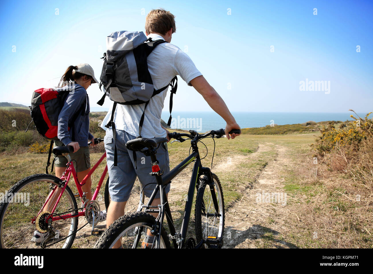 Biker Man Walking High Resolution Stock Photography and Images - Alamy
