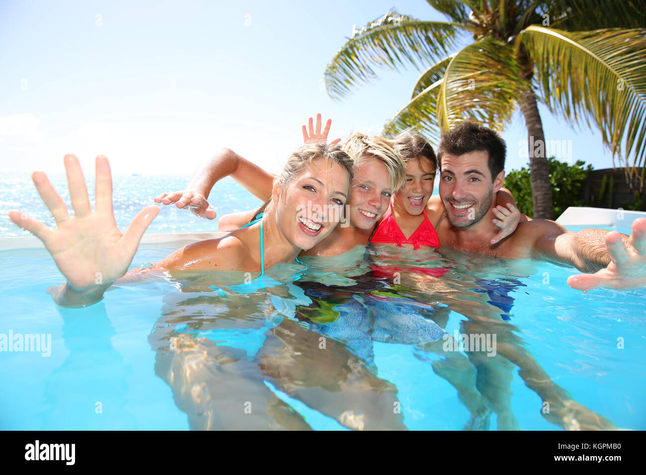Children swimming in an infinity pool hi-res stock photography and ...