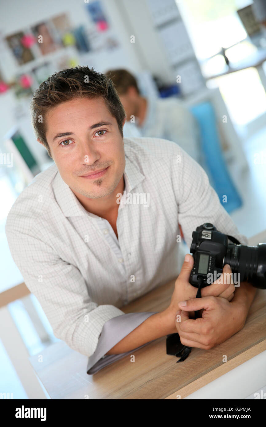 Portrait of photographer in training course Stock Photo - Alamy