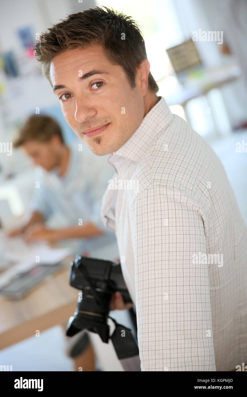 Portrait of photographer in training course Stock Photo - Alamy