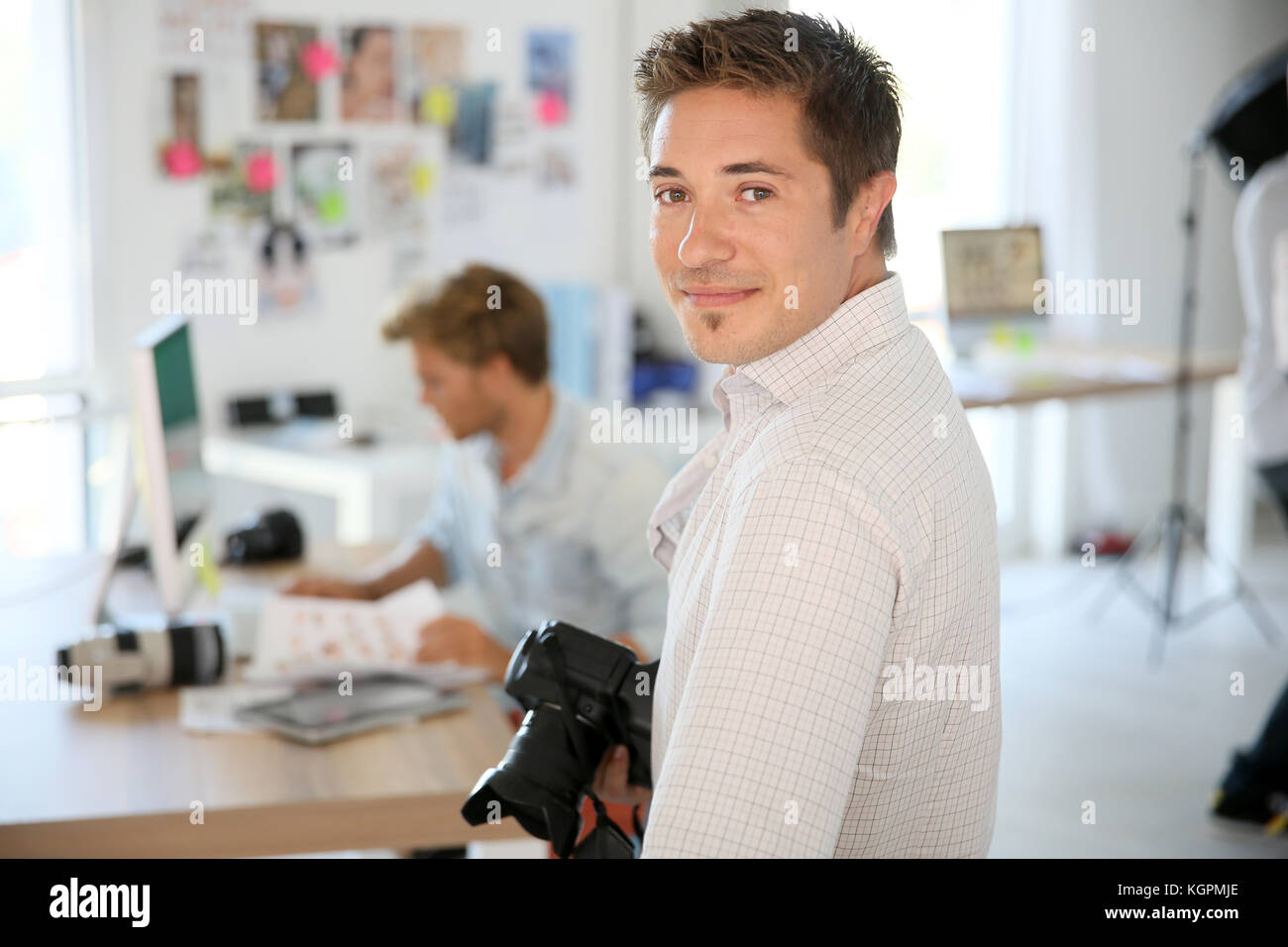 Portrait of photographer in training course Stock Photo - Alamy