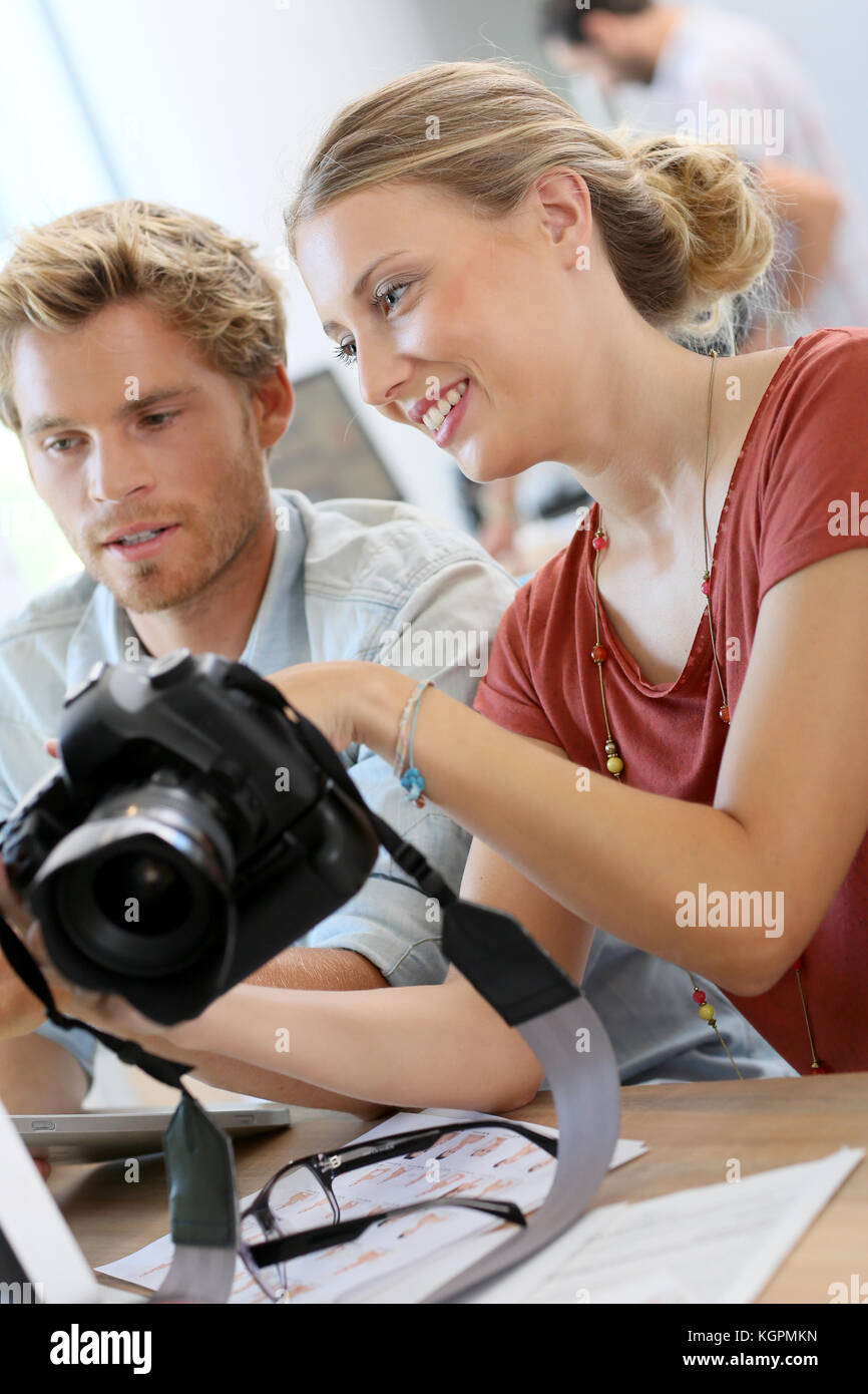 Students in photography working on project Stock Photo - Alamy
