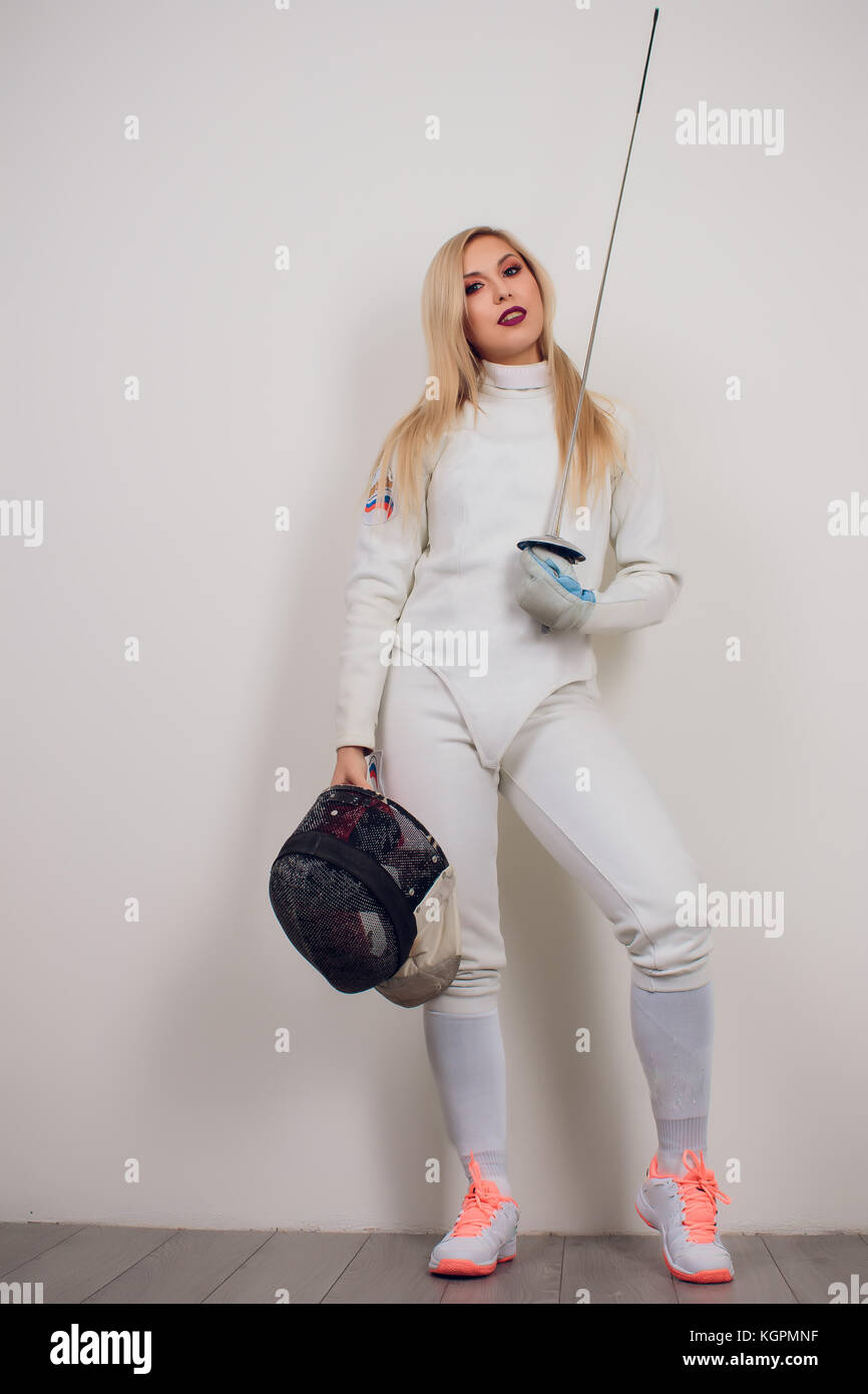 Woman wearing fencing suit hi-res stock photography and images - Alamy
