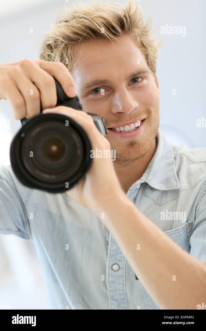 Fashion photographer shooting model in studio Stock Photo - Alamy