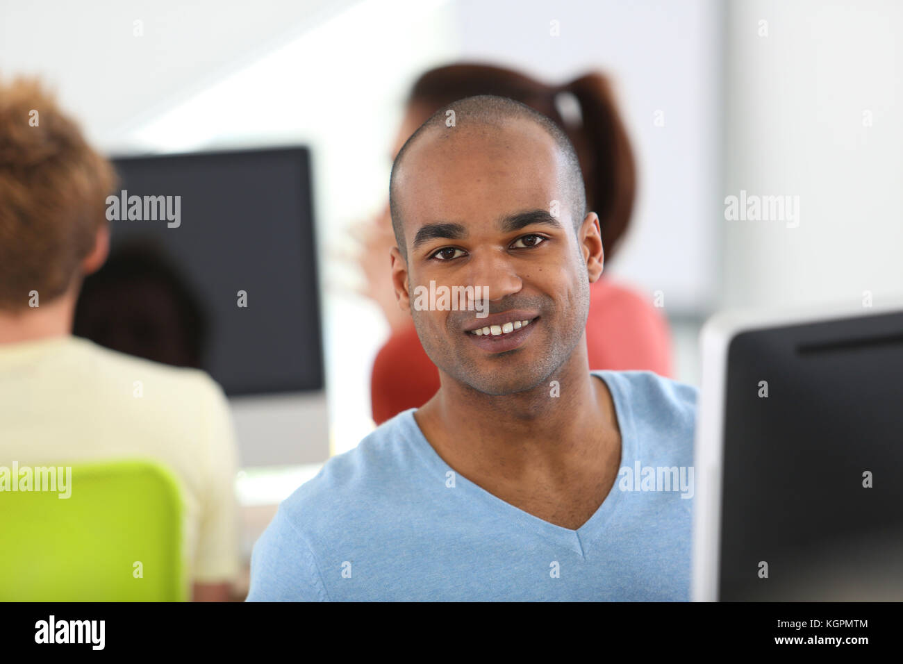 Man working on desktop computer Stock Photo - Alamy