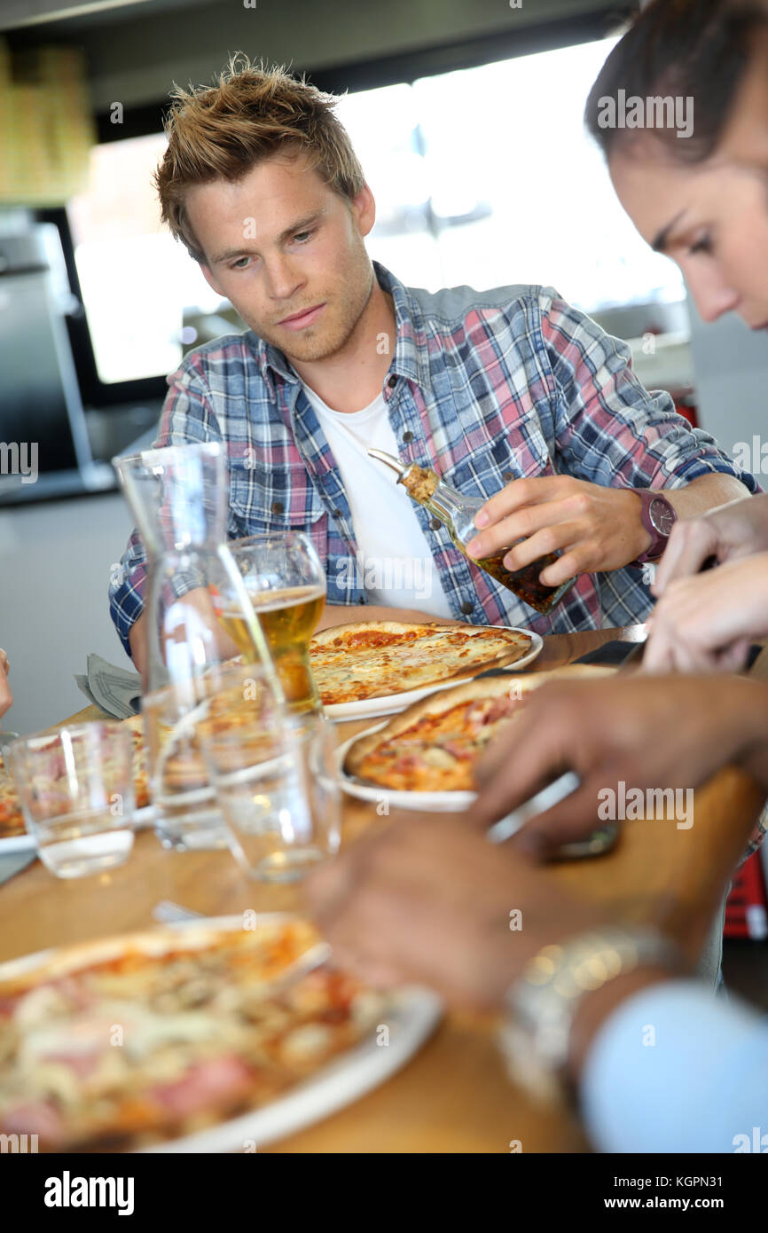 Old man eating pizza hi-res stock photography and images - Alamy