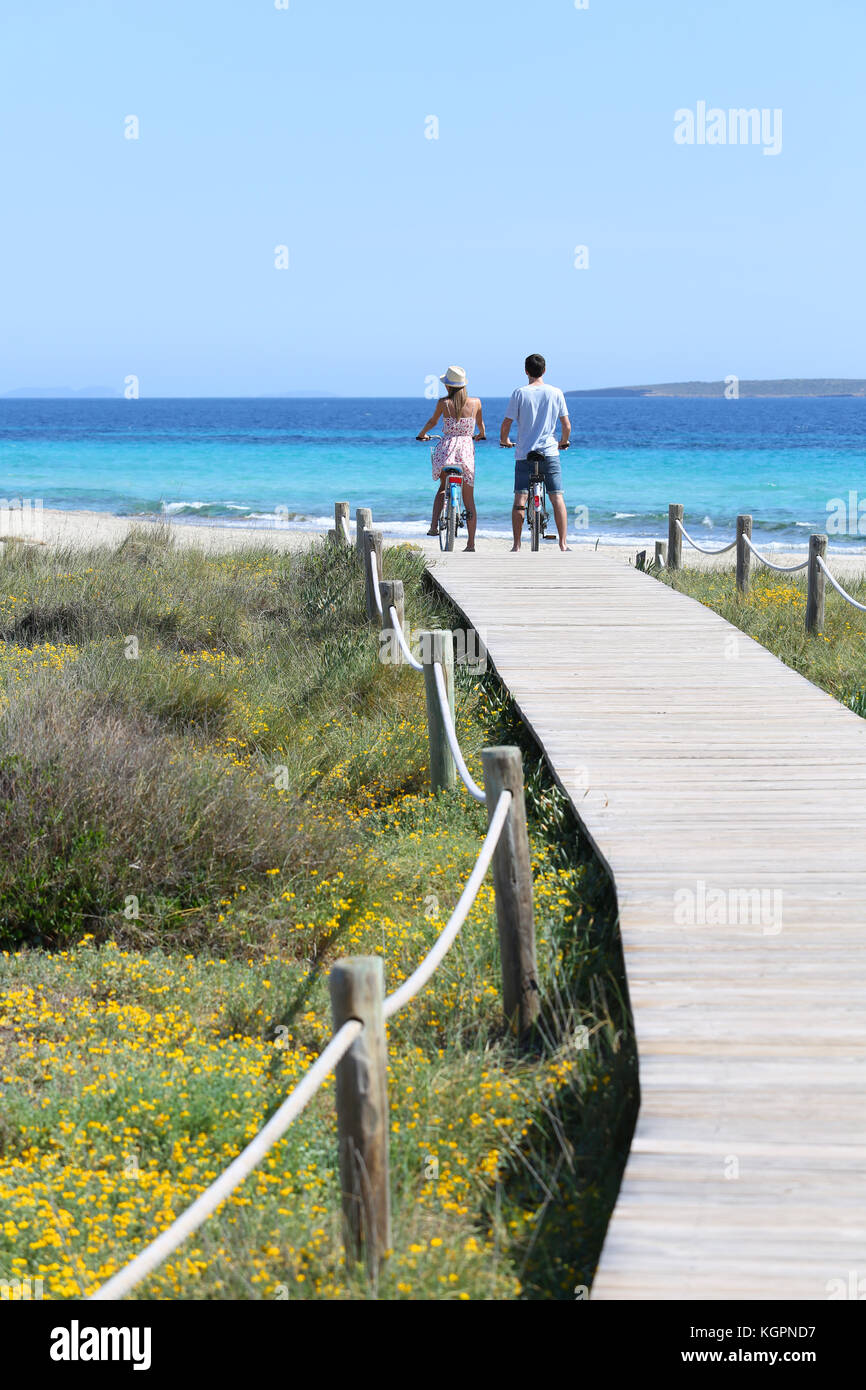 Woman riding on bike path spain hi-res stock photography and images - Alamy