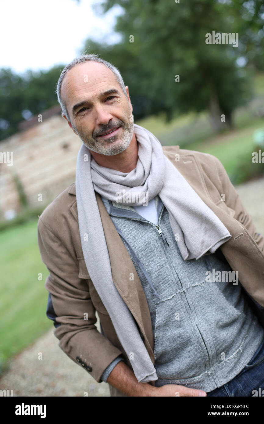 Handsome senior man smiling park hi-res stock photography and images ...