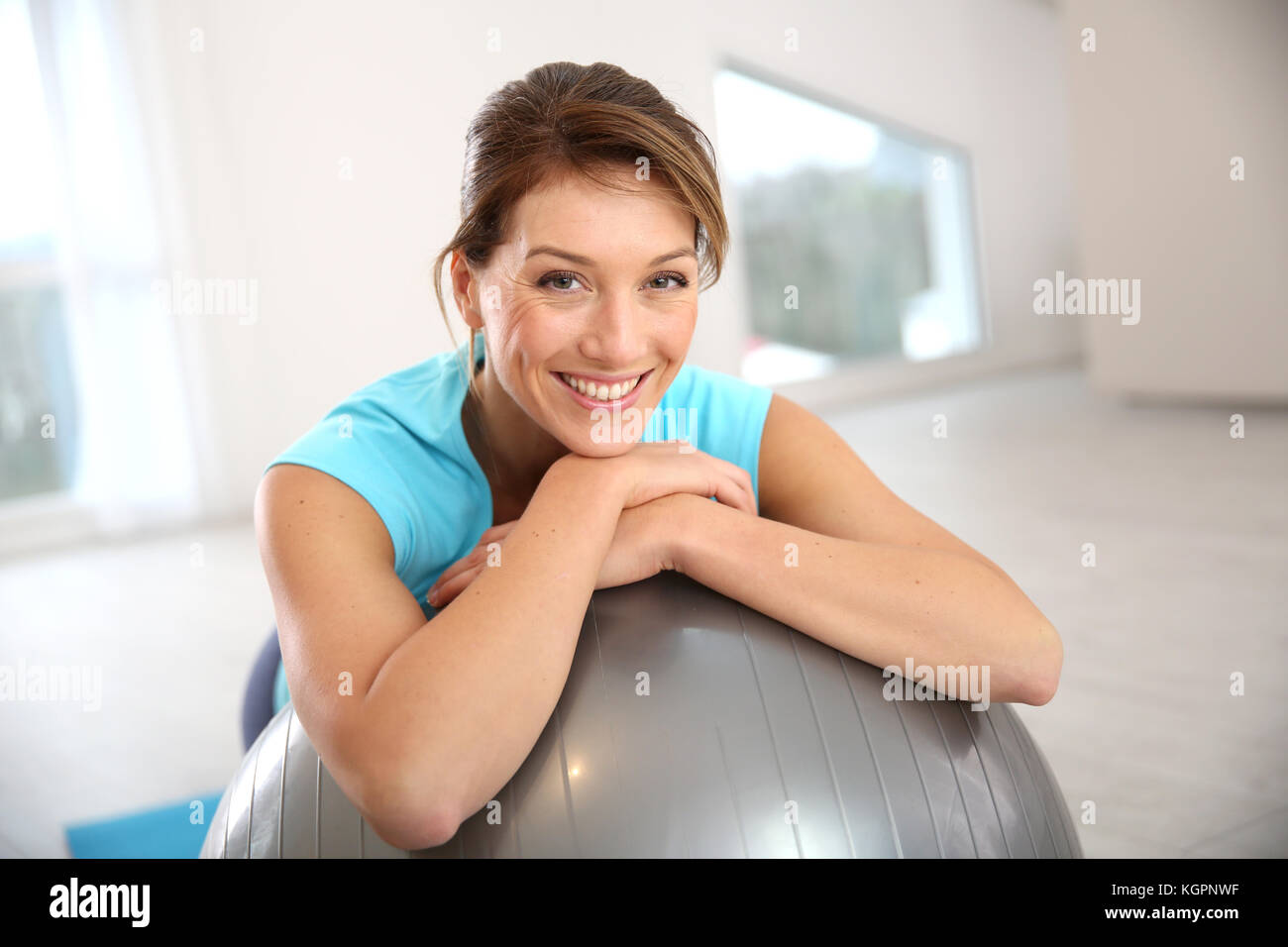 Woman doing pilates and balance exercises Stock Photo - Alamy
