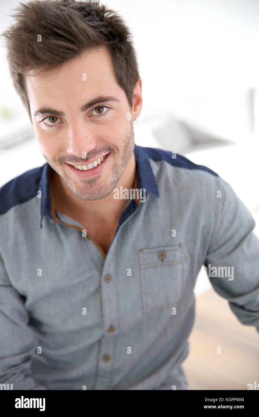 Smiling handsome man looking at camera Stock Photo - Alamy