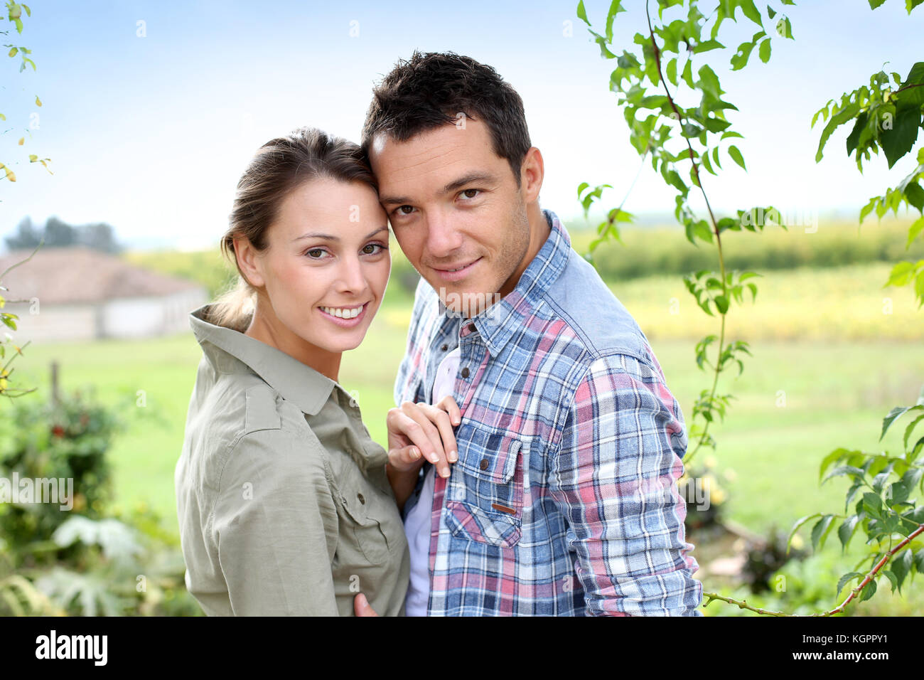 Portrait of sweet couple in countryside Stock Photo - Alamy