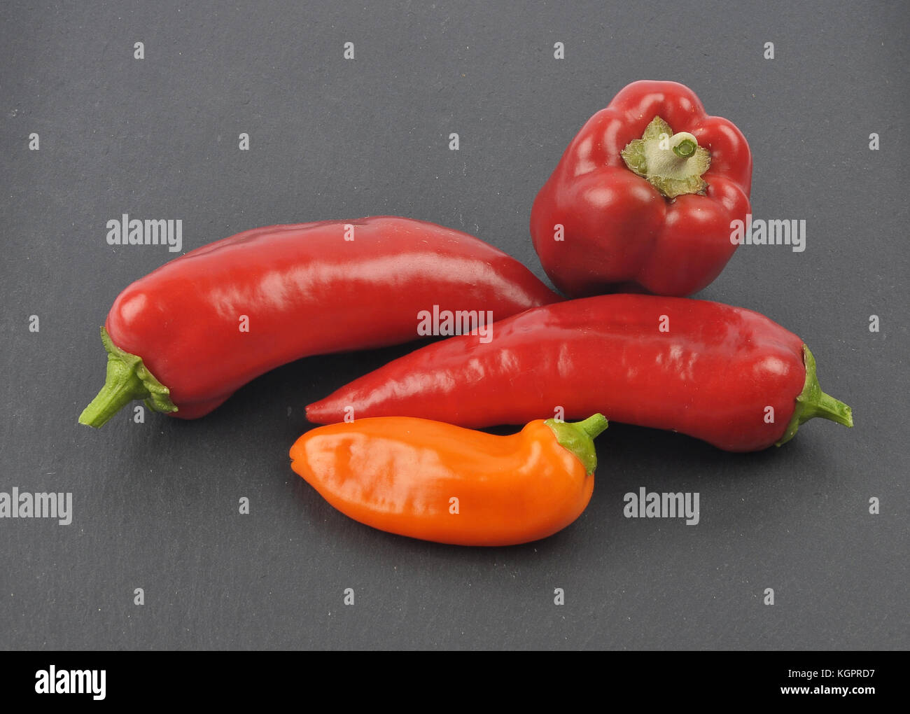 Ball pepper on slate Stock Photo - Alamy