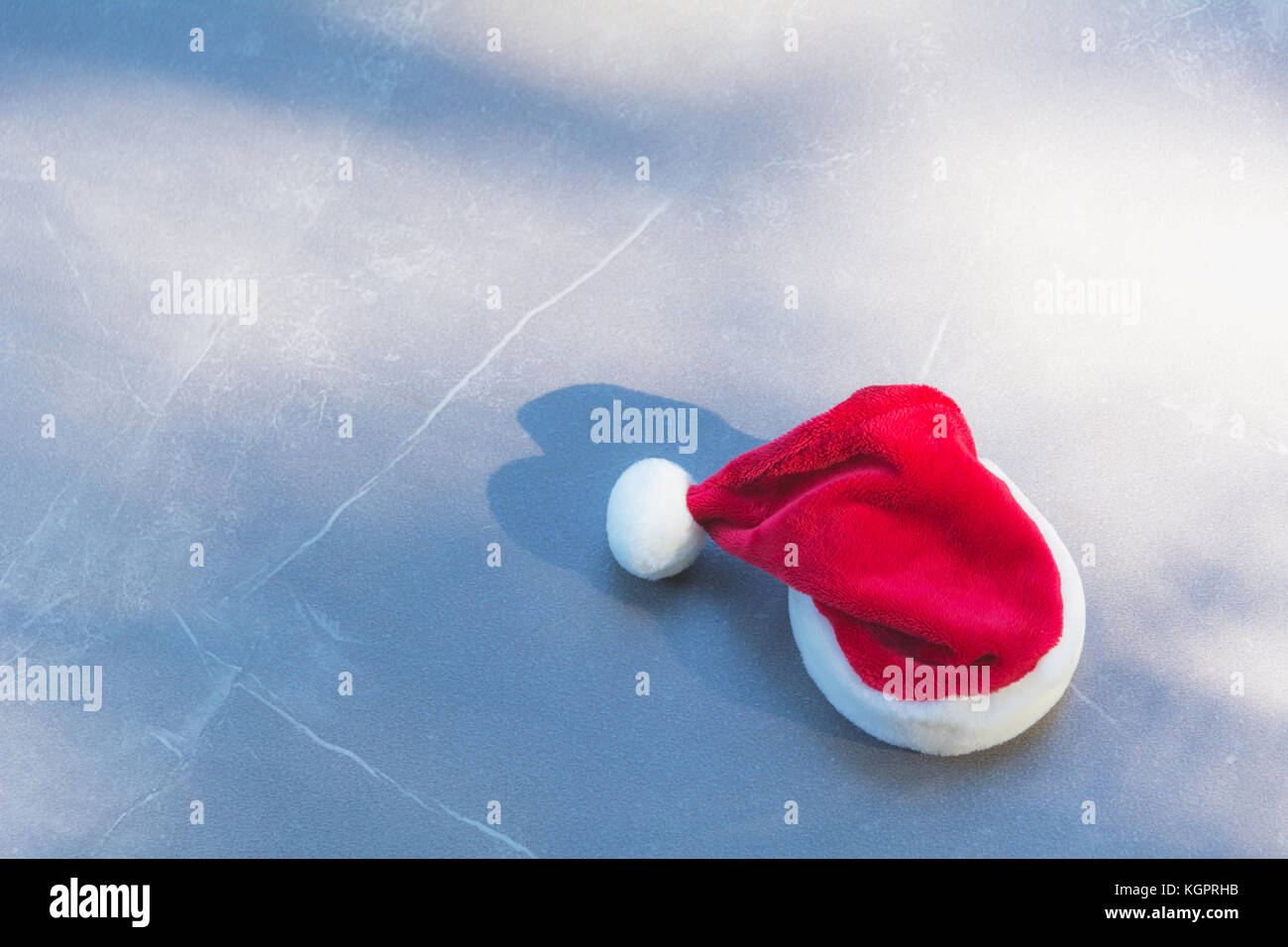 Santa Claus red hat in Christmas day on table background with copy ...