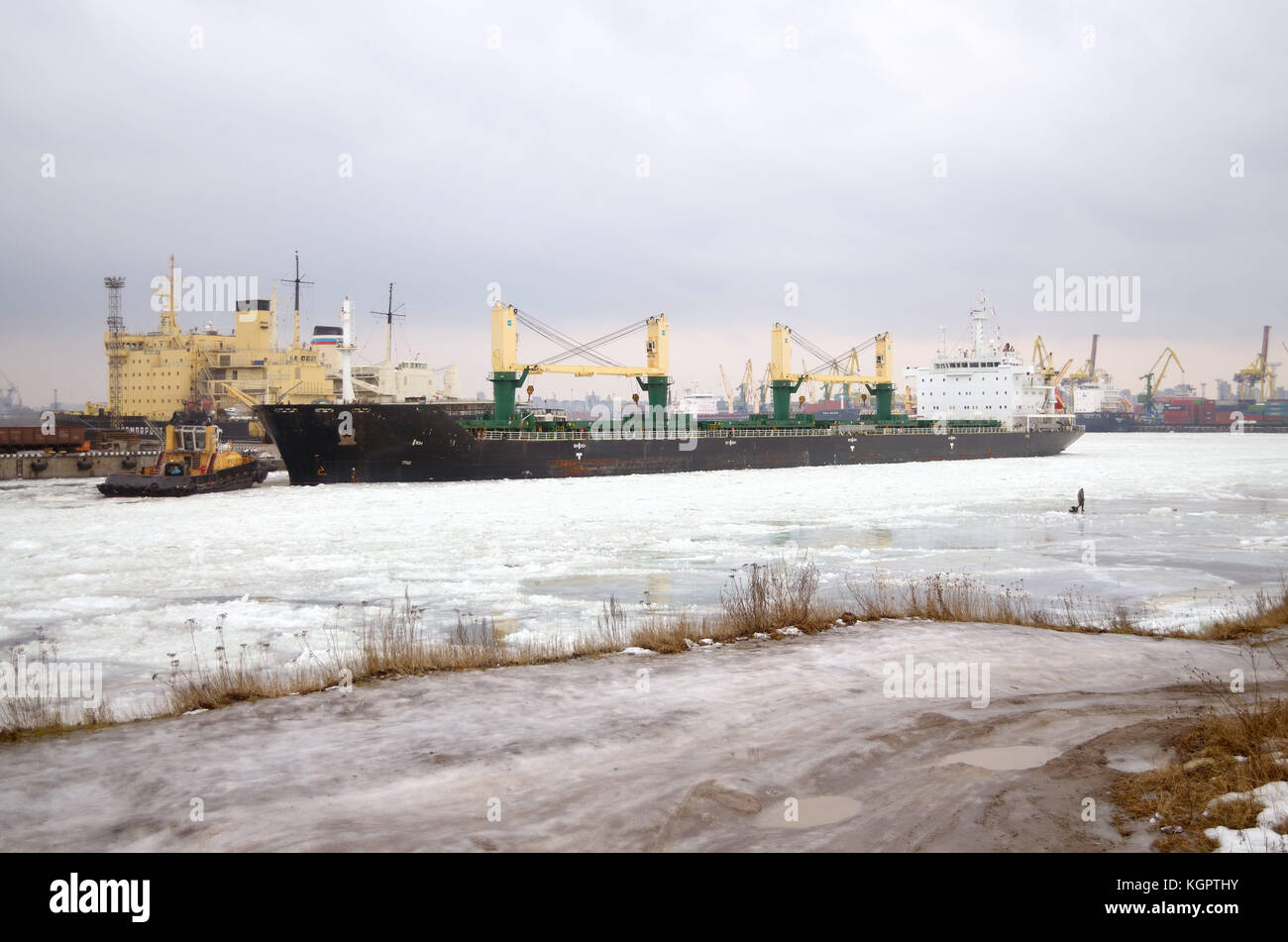 In the Russian port in St. Petersburg is loading various different ...