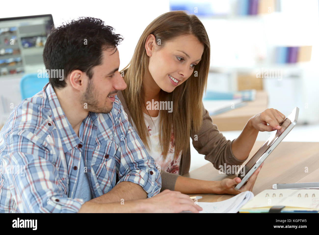 Students in training class using digital tablet Stock Photo - Alamy
