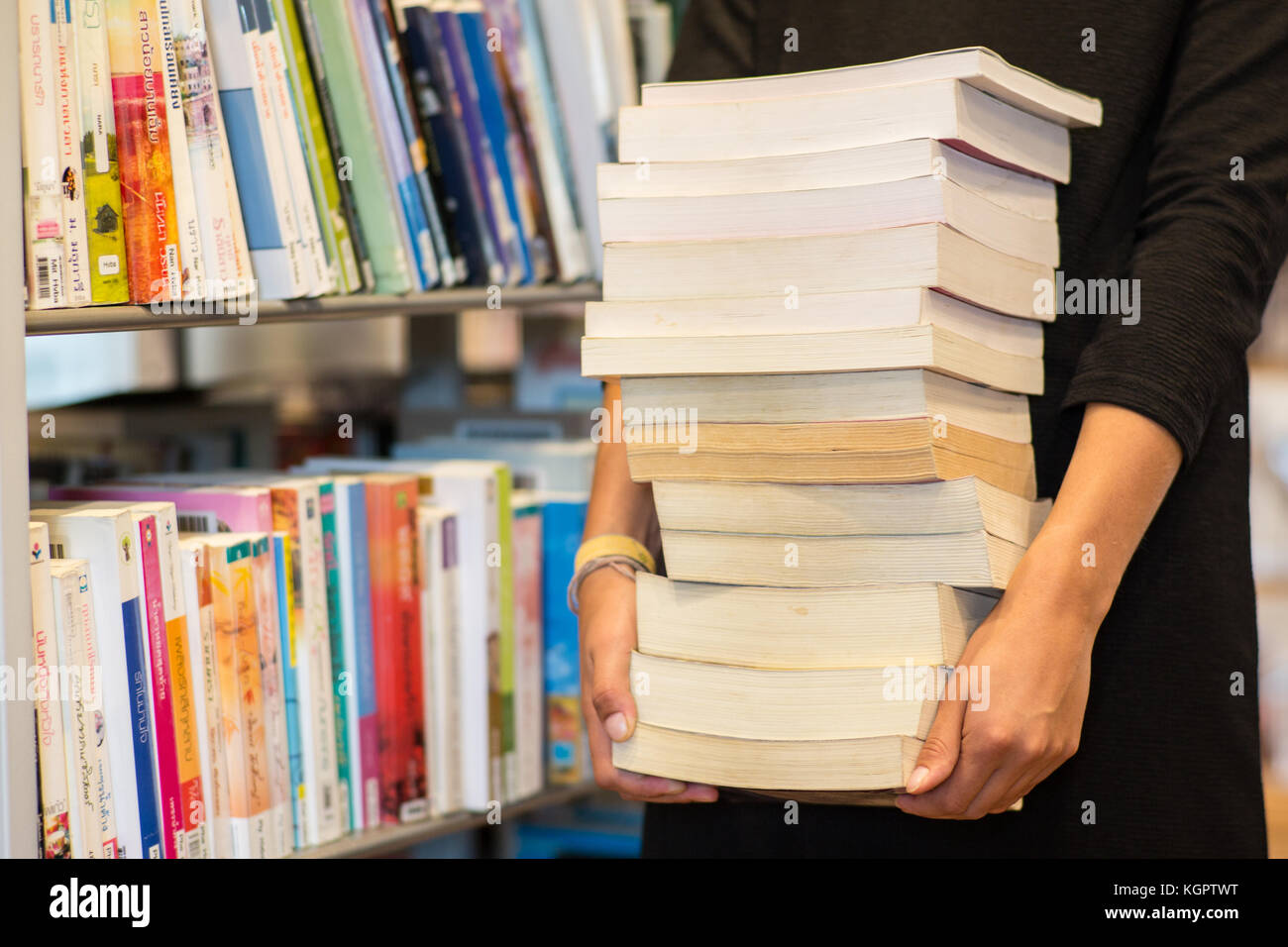 Young female librarian hi-res stock photography and images - Alamy