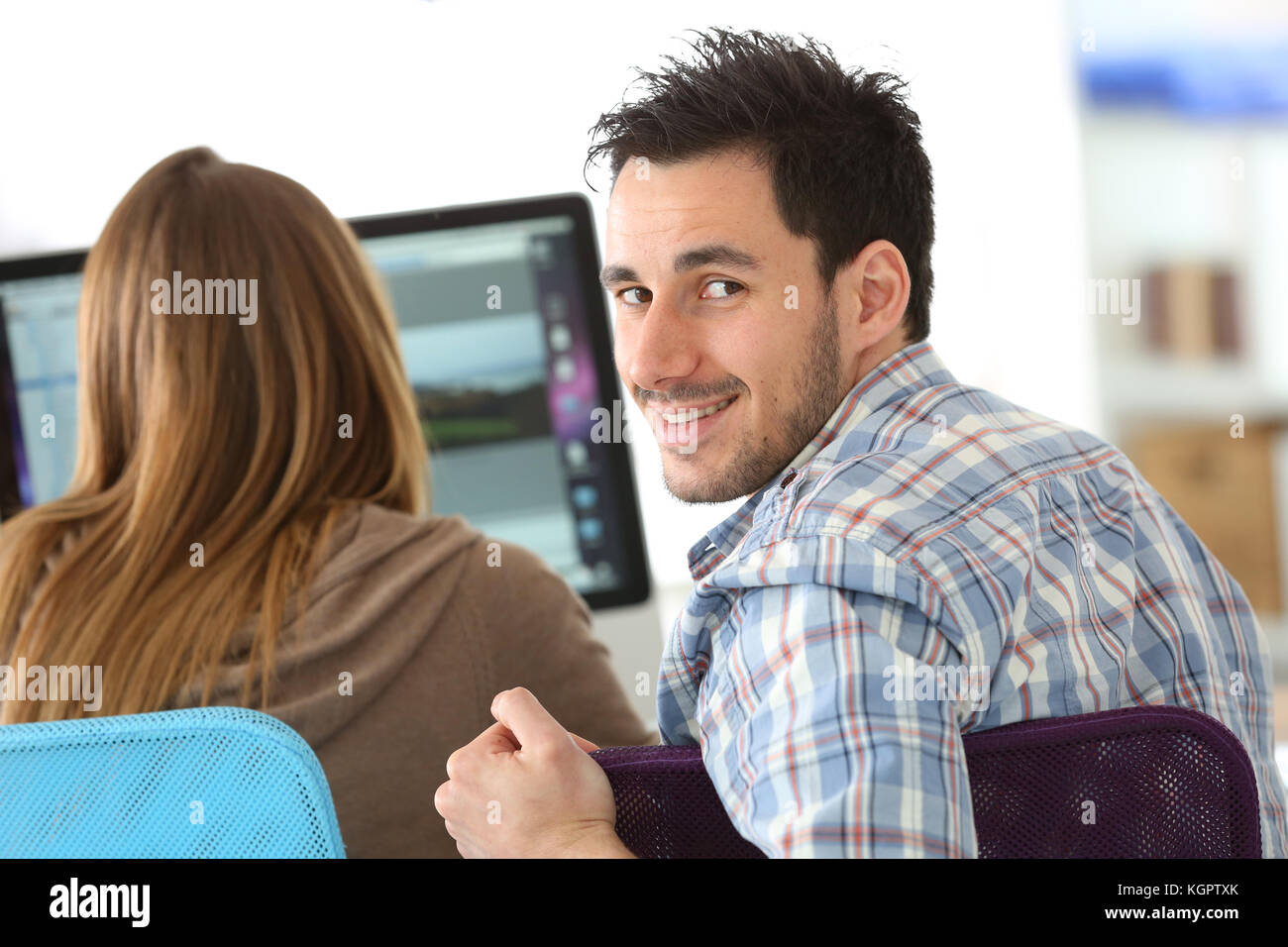 Business people meeting in front of desktop Stock Photo - Alamy