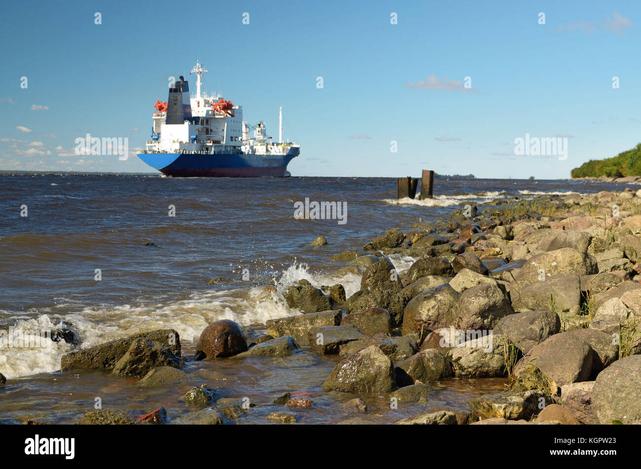 Water landscape with receding ship on the horizon Stock Photo - Alamy