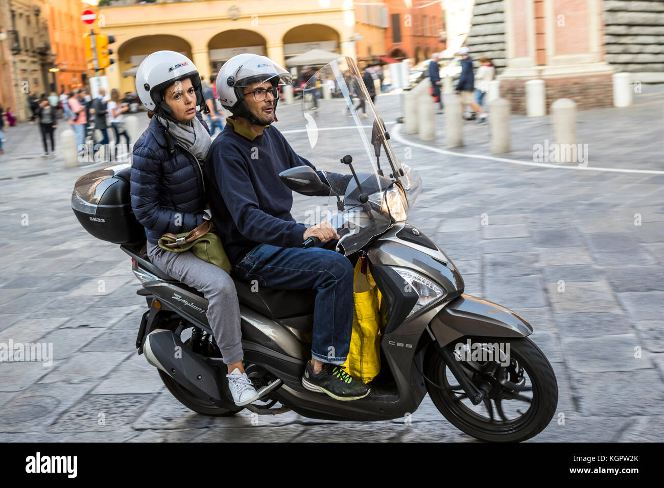 Motorcycle and scooter commuting. Bologna city life, Italy Stock Photo ...