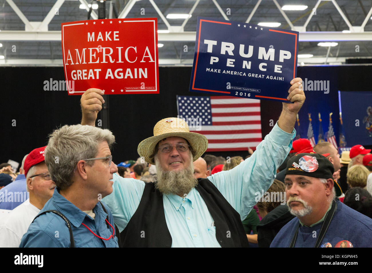 Manheim, PA - October 1, 2016: An Amish man enthusiastically waves a ...