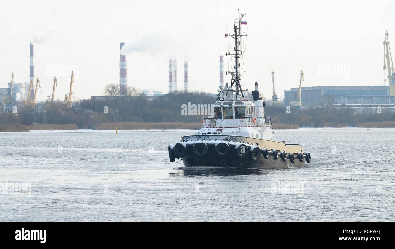 The territory of the port.Working boat floats on the sea Stock Photo ...