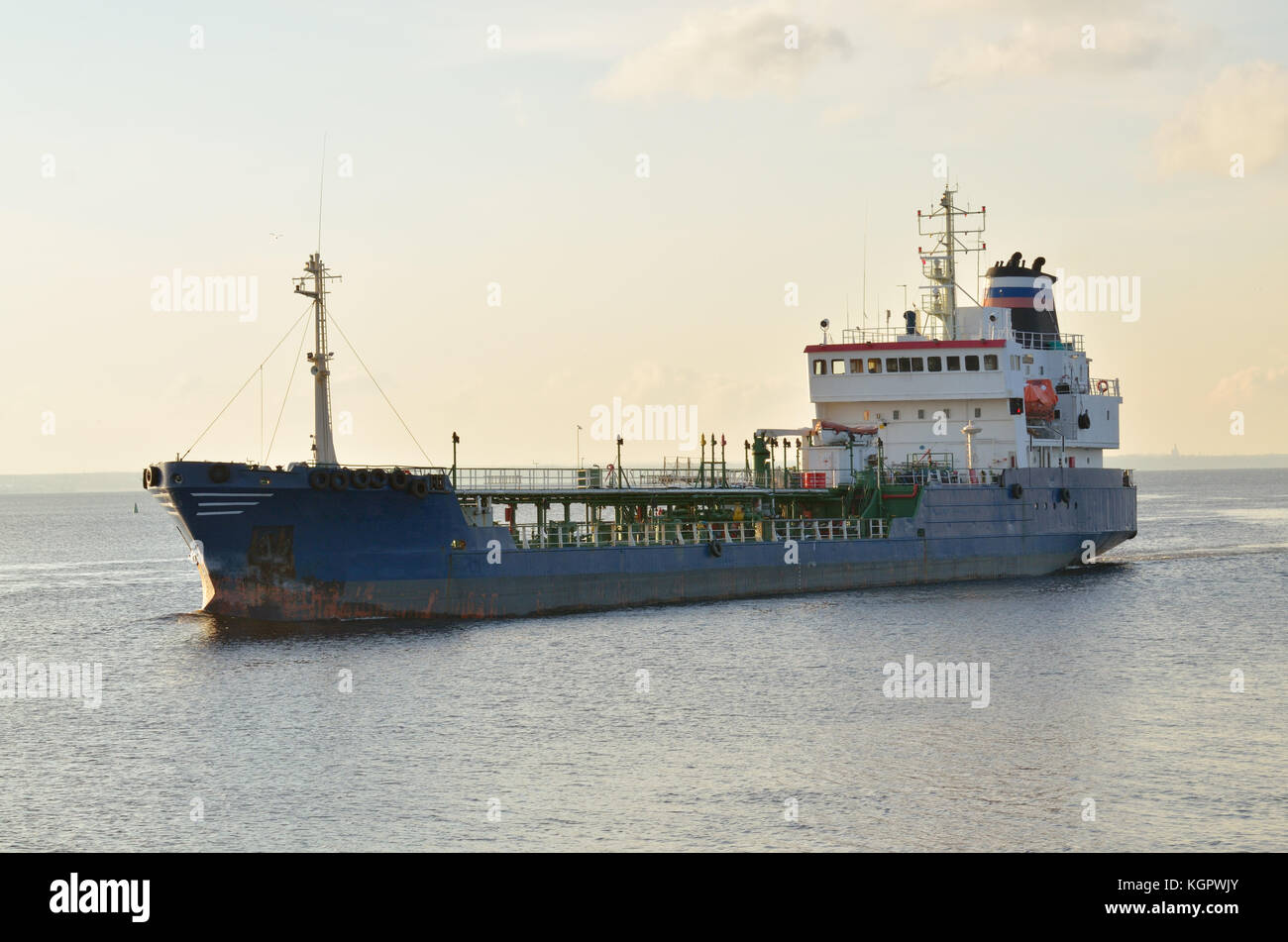 On the horizon the sea is visible floating tanker Stock Photo - Alamy