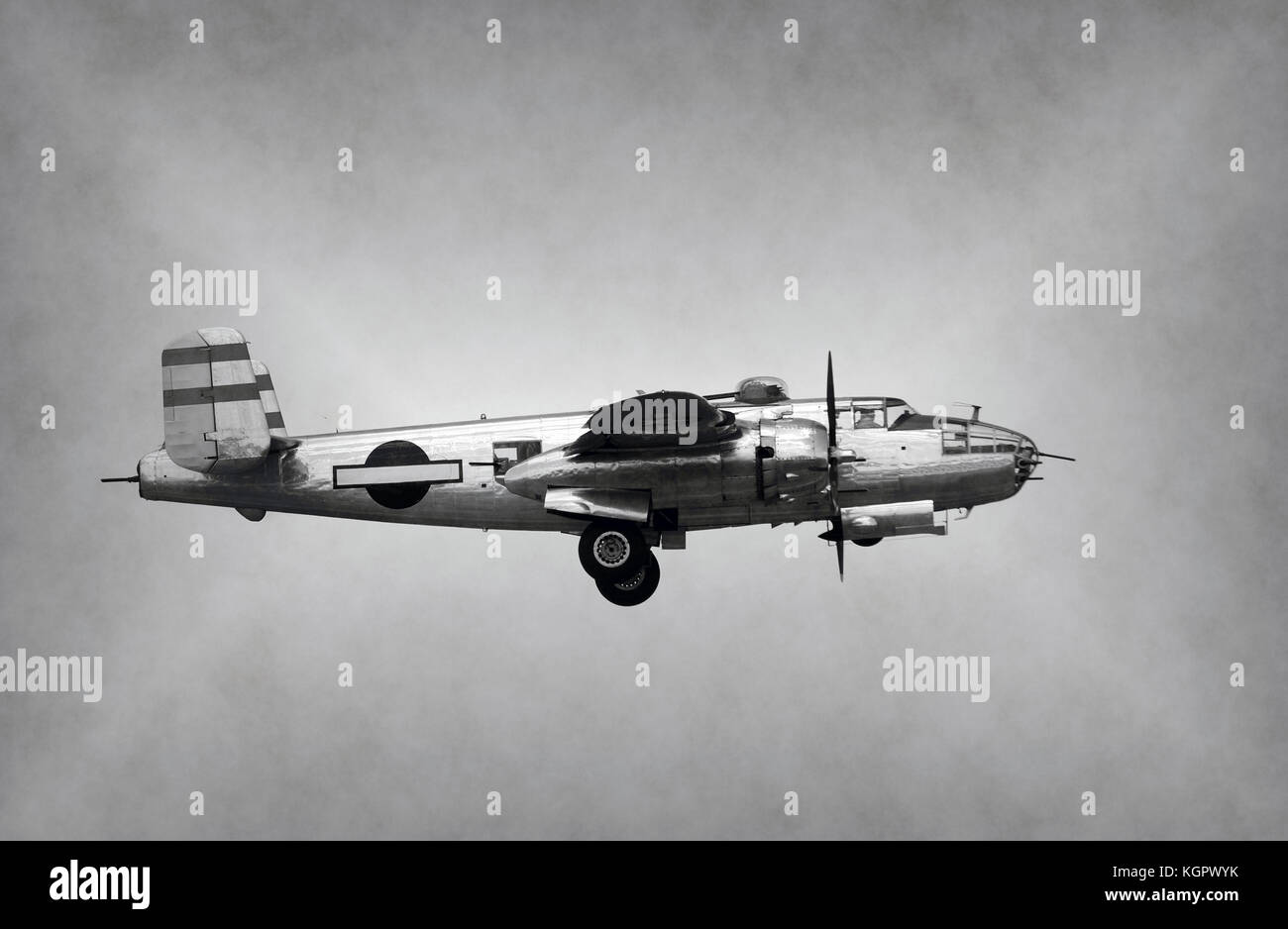 World War II era bomber in flight side view Stock Photo - Alamy