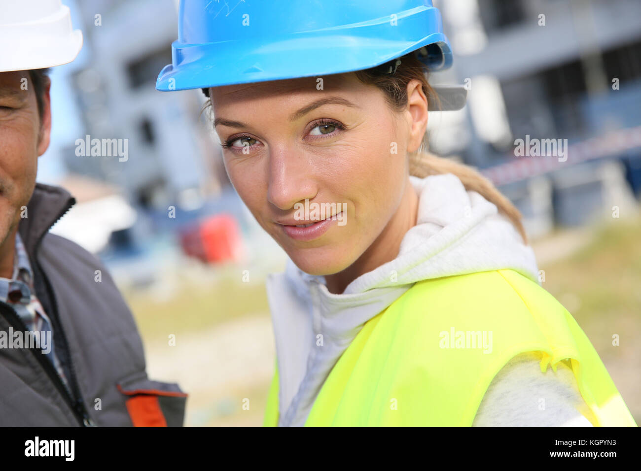 Portrait of woman engineer working on building site Stock Photo - Alamy