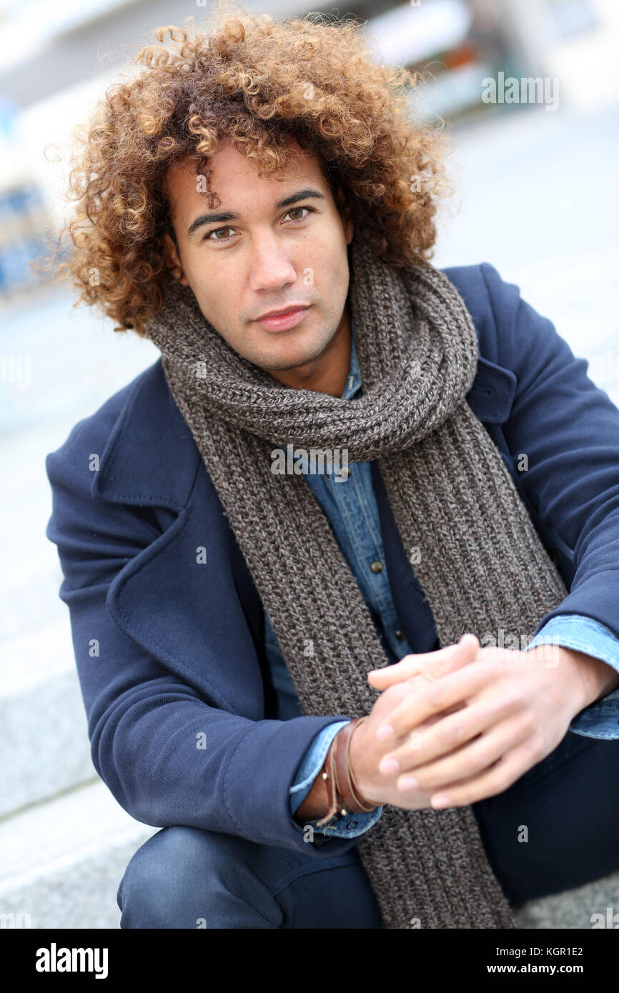 Handsome mixed-raced guy in city street Stock Photo - Alamy