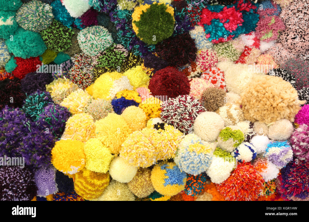 background of so many wool ponpon very soft and colorful Stock Photo ...