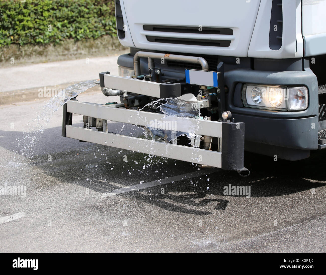 big trucks for cleaning the streets of the city Stock Photo - Alamy