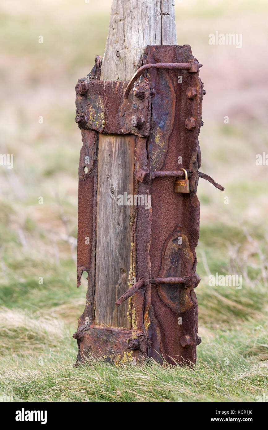 old iron post ground support, badly rusted and corroded Stock Photo - Alamy