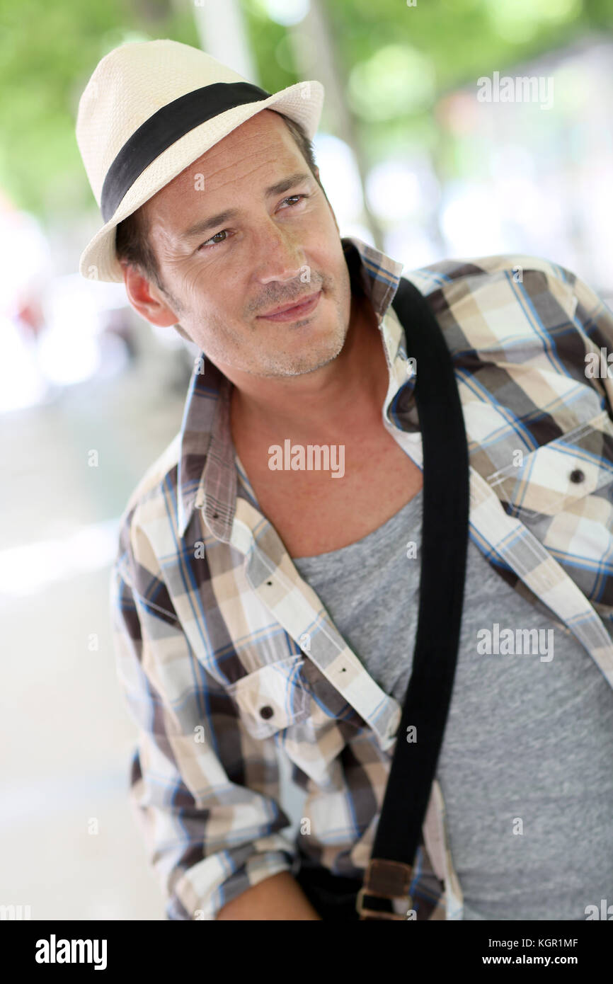 Photo reporter walking in town Stock Photo - Alamy