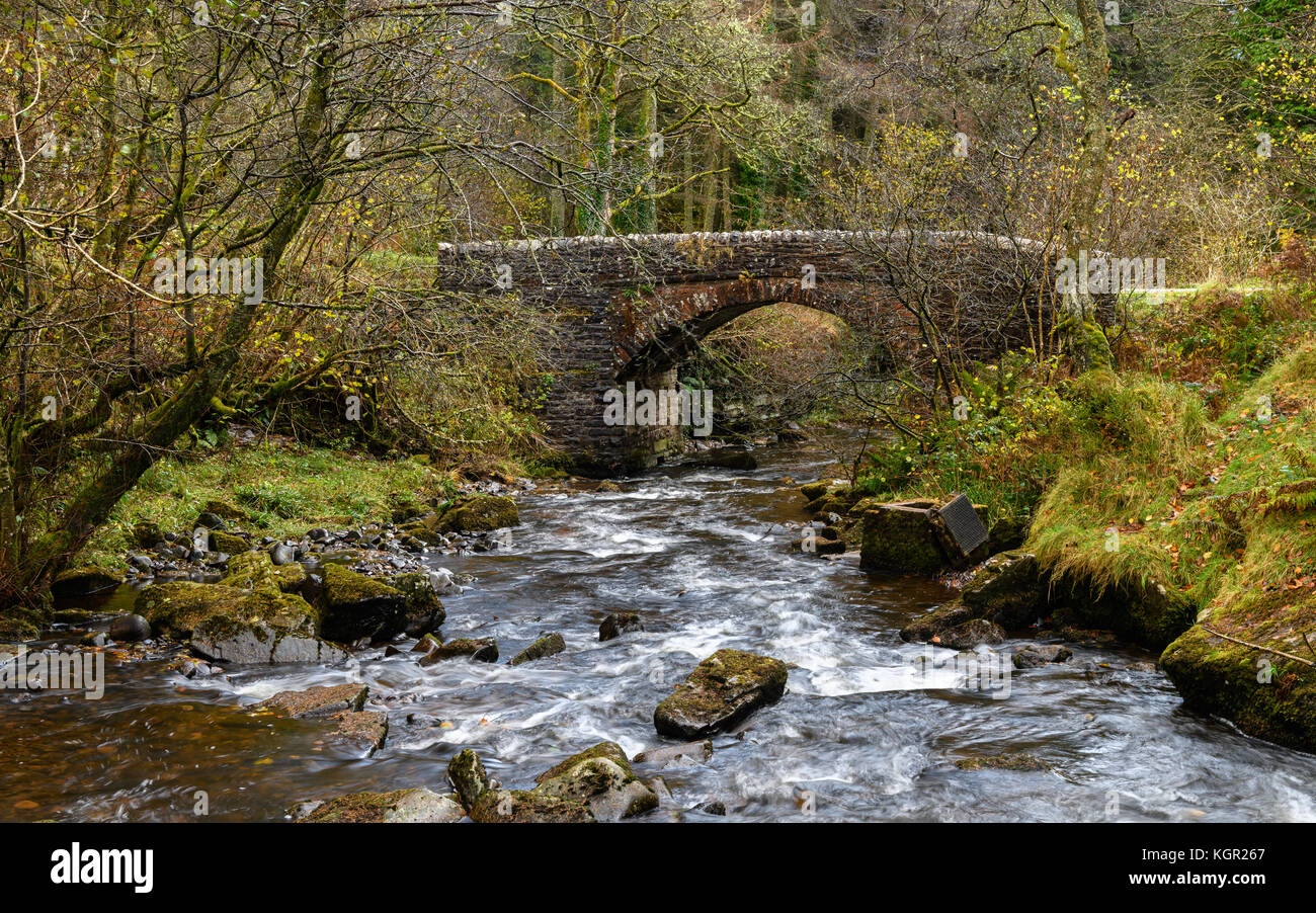 Stone bridge over a river Stock Photo - Alamy