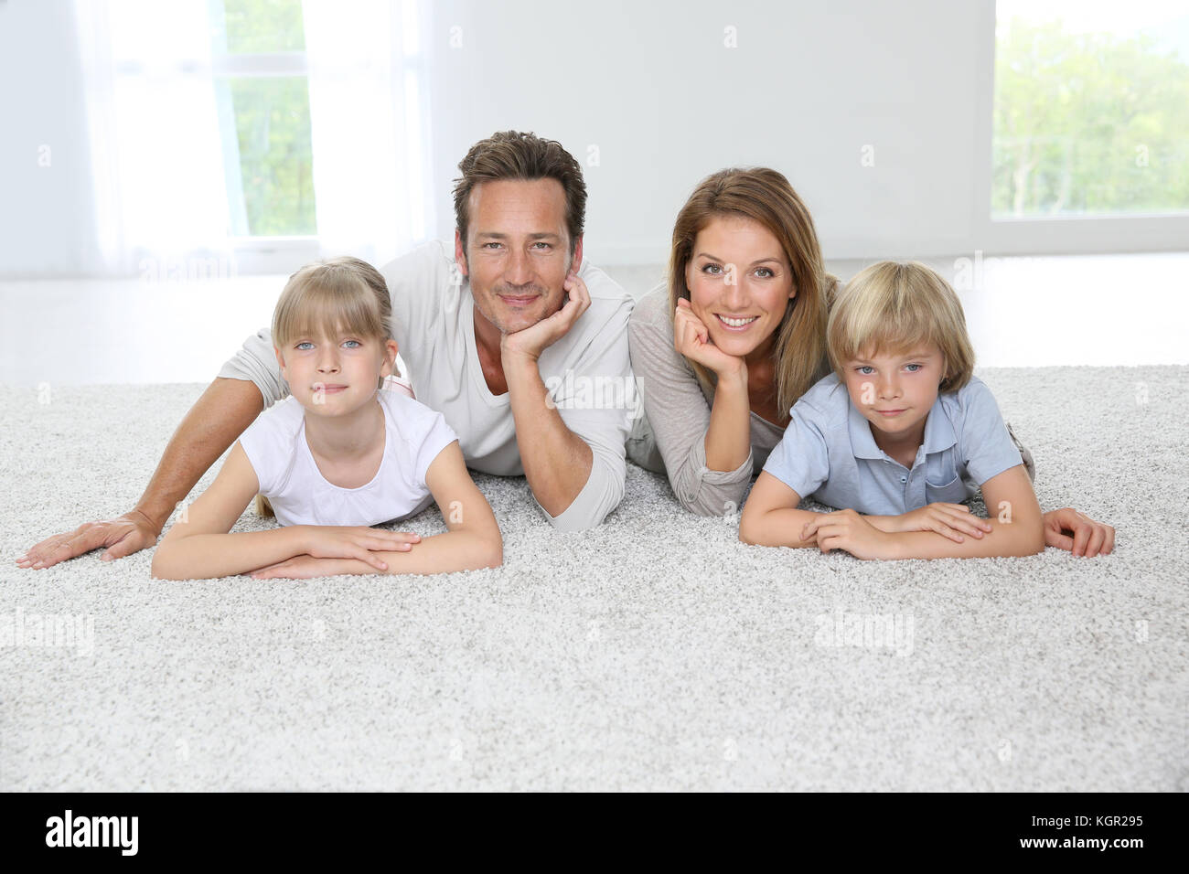 Kids laying on floor hi-res stock photography and images - Alamy