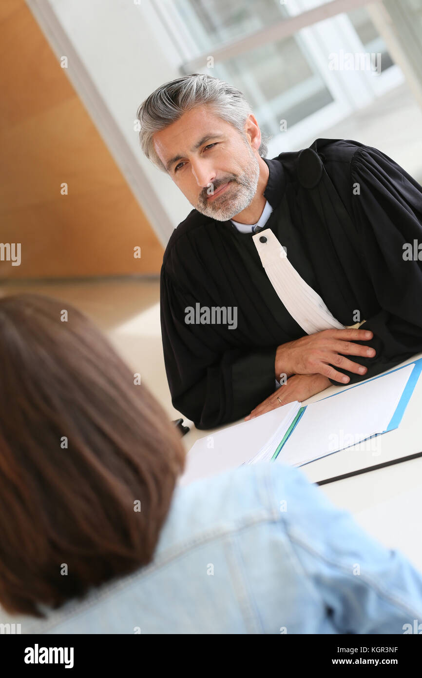 Lawyer meeting client in courthouse office Stock Photo - Alamy