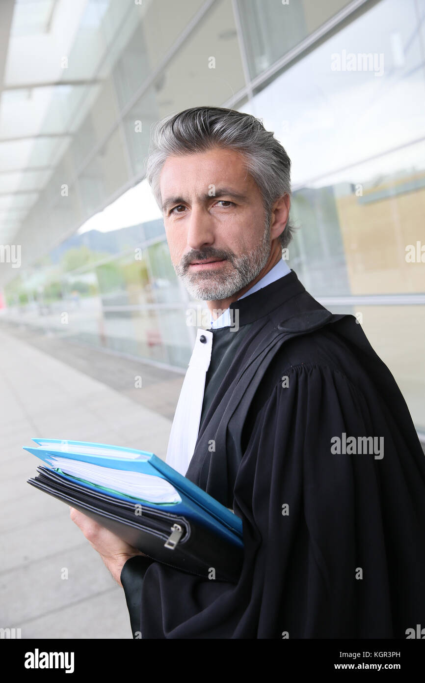 Portrait of lawyer standing outside courthouse building Stock Photo - Alamy