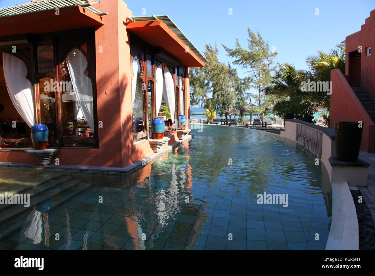 View of resort swimming-pool Stock Photo - Alamy