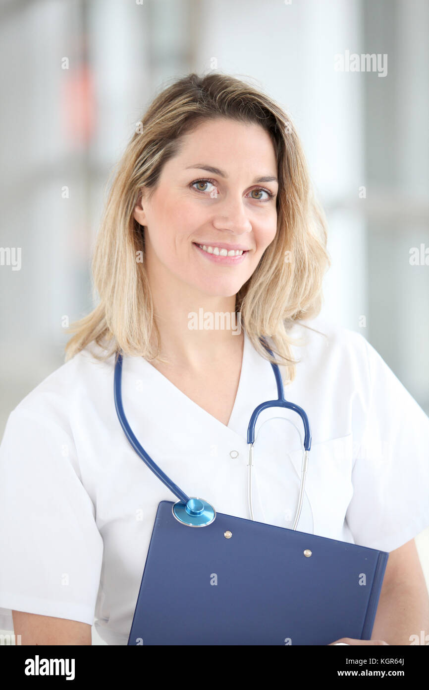 Portrait of beautiful smiling nurse Stock Photo - Alamy