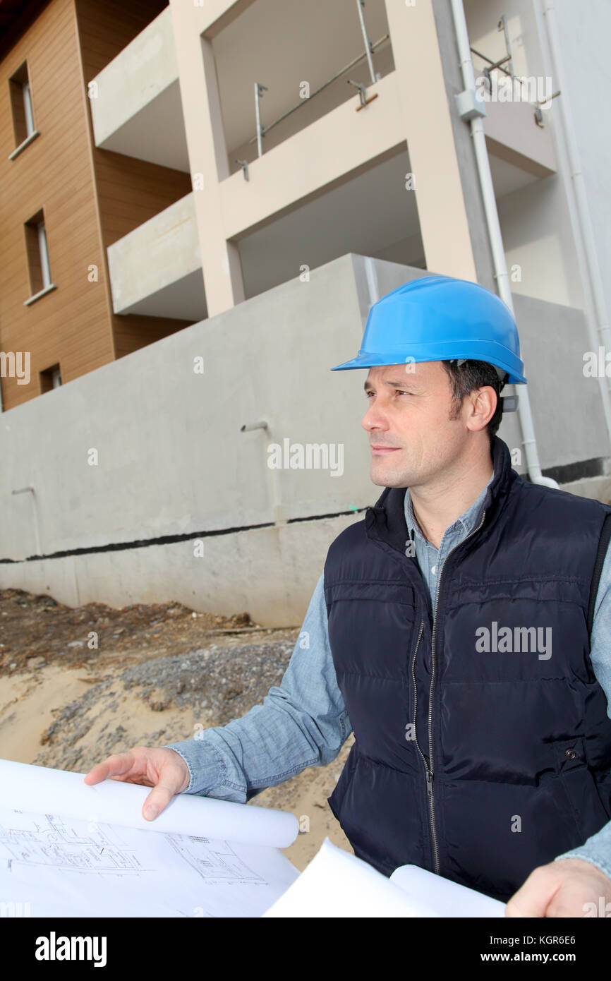 Construction manager on building site Stock Photo - Alamy