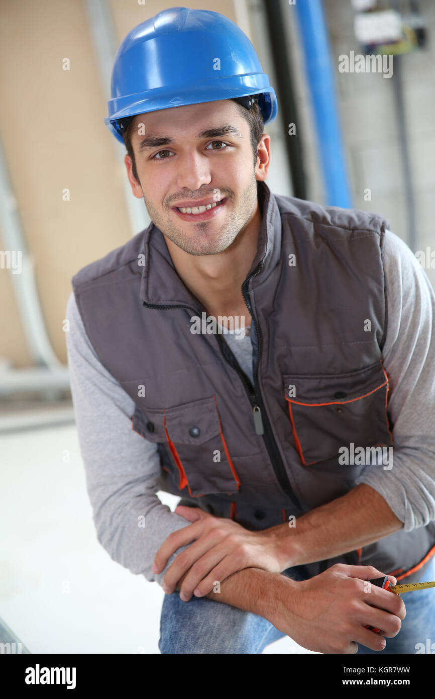 Young construction worker on site Stock Photo - Alamy