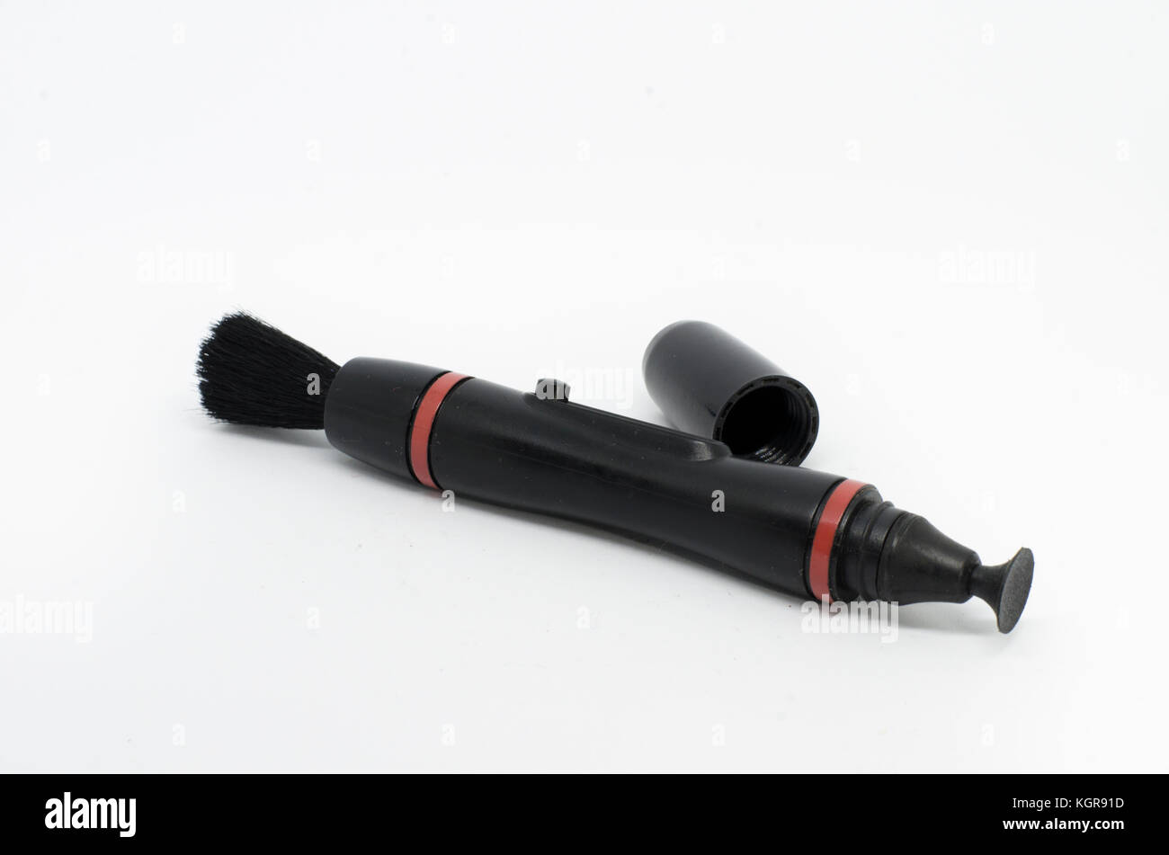 lens pen,Lens cleaning tools isolated on a white background Stock Photo ...