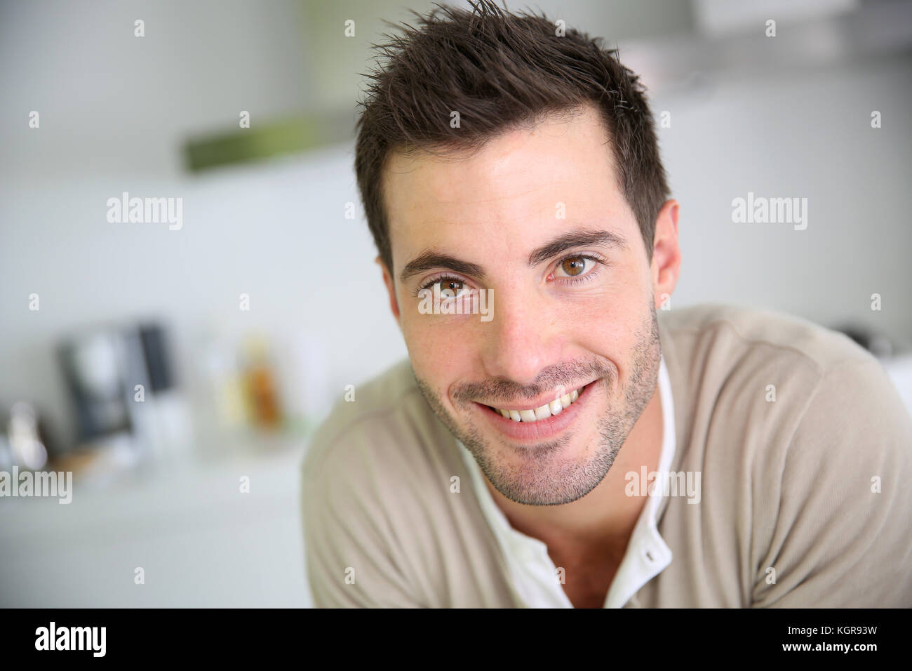Portrait of smiling attractive man Stock Photo - Alamy