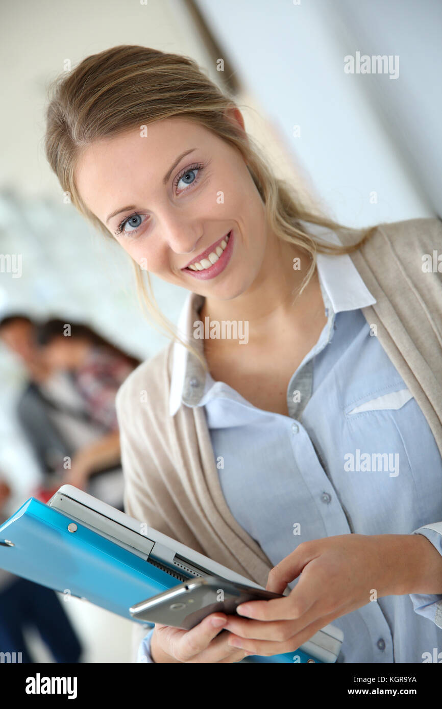 Young woman sending short text message Stock Photo - Alamy