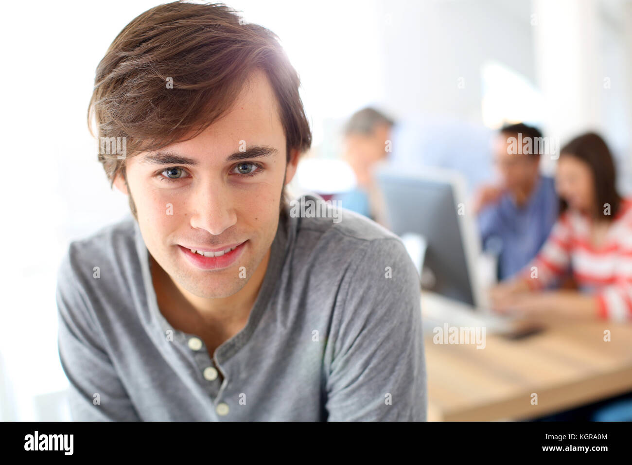 Portrait of smiling student in school class Stock Photo - Alamy