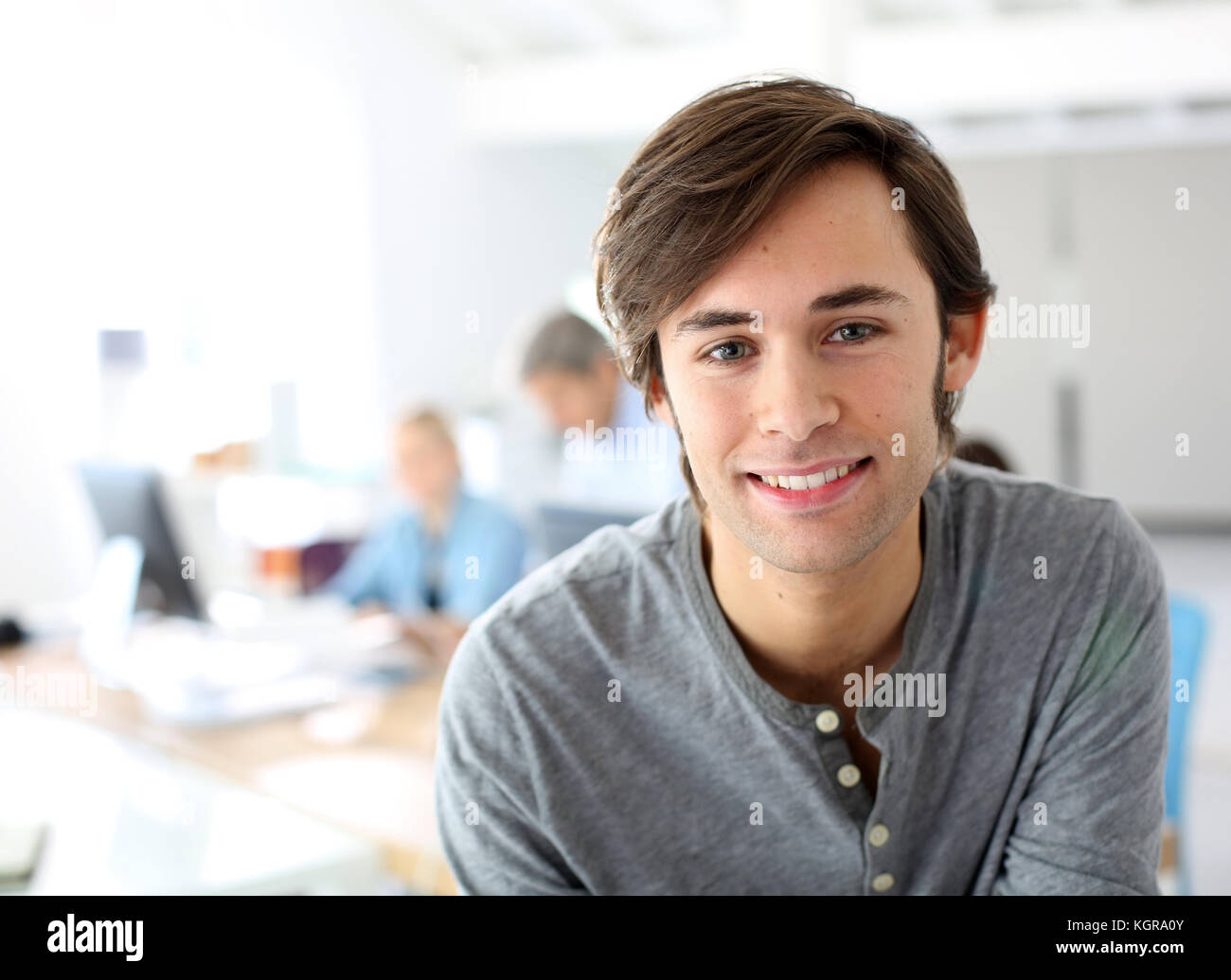 Portrait of smiling student in school class Stock Photo - Alamy