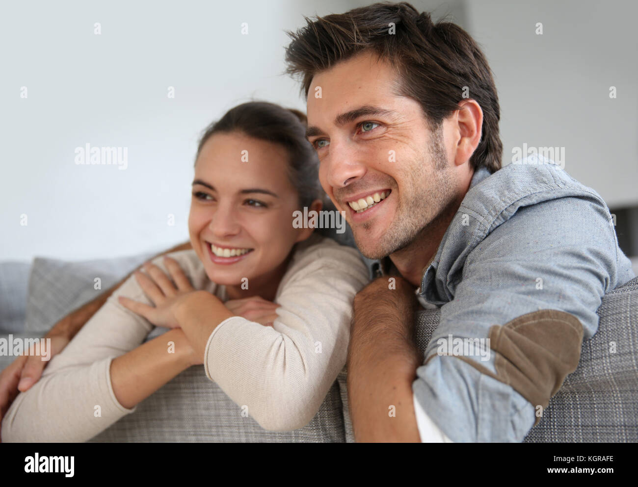 Married couple home on sofa hi-res stock photography and images - Alamy