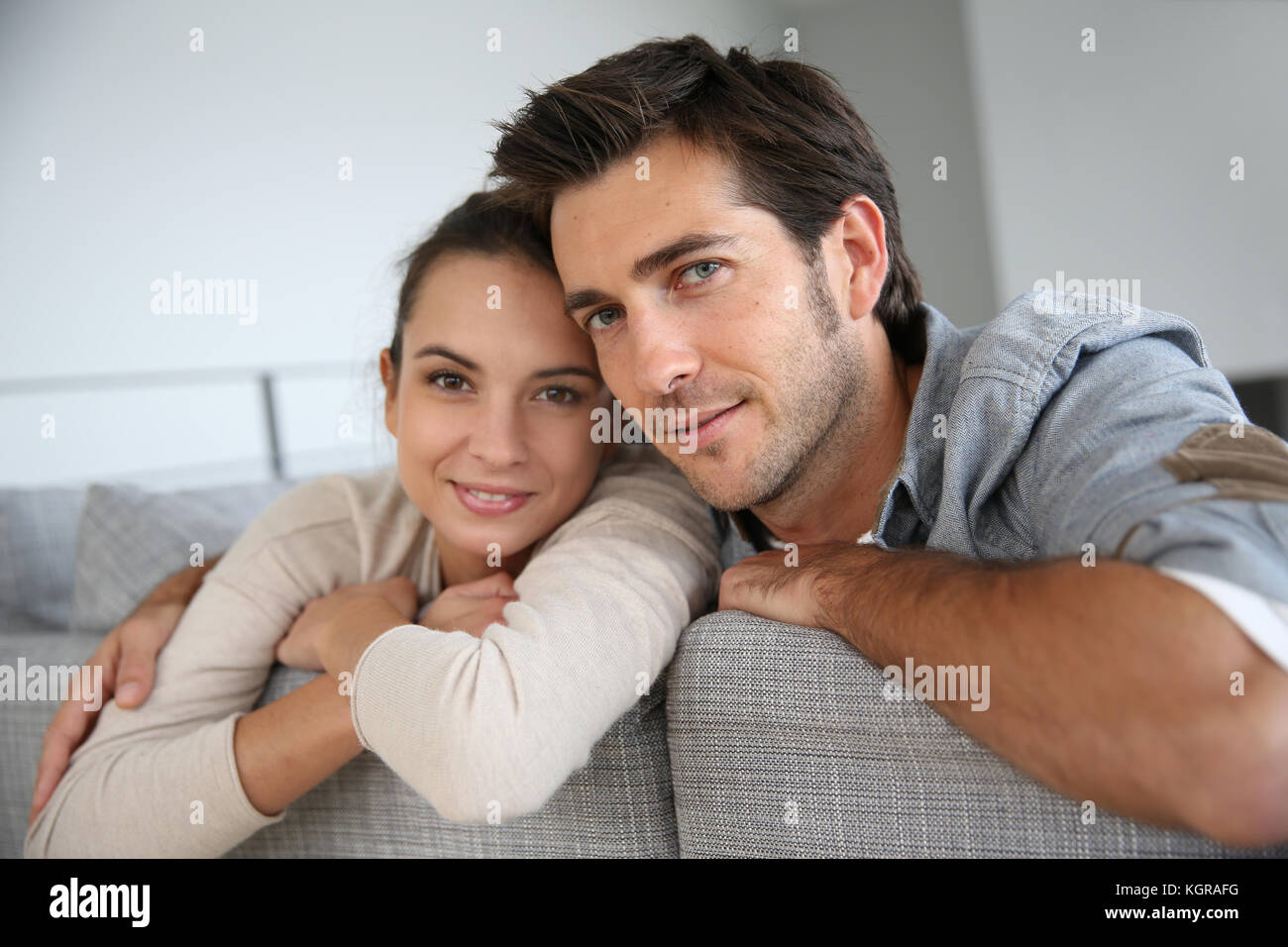 Married couple home on sofa hi-res stock photography and images - Alamy