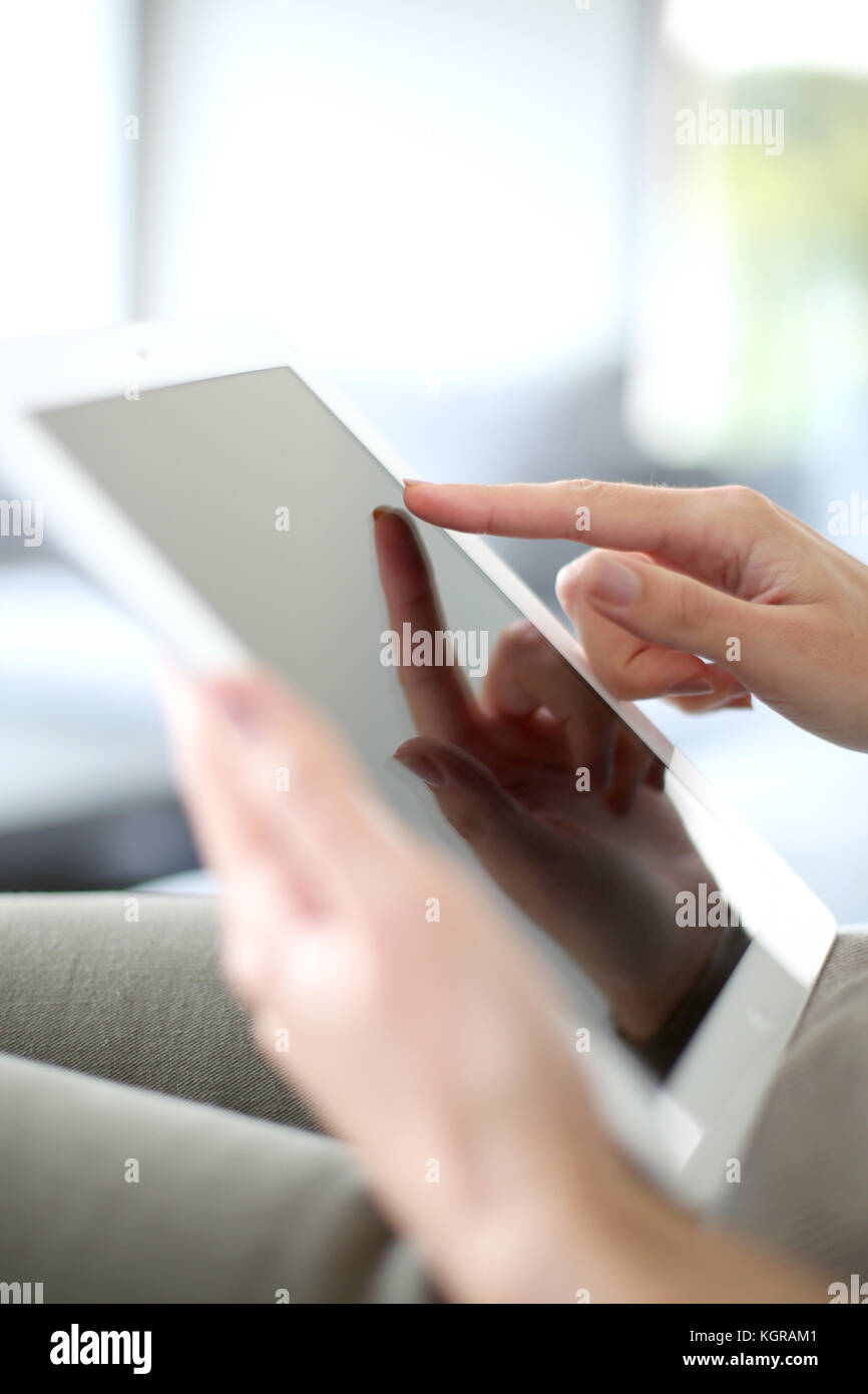 Closeup hand sliding on digital hi-res stock photography and images - Alamy